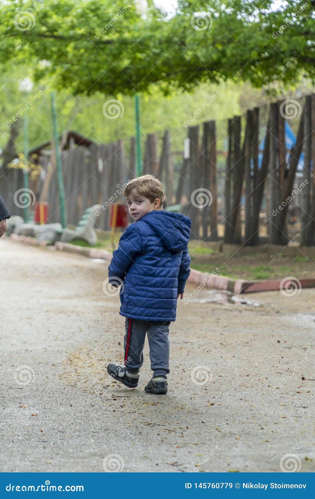 Small Child Looking Back Over His Shoulder Stock Image - Image of ...