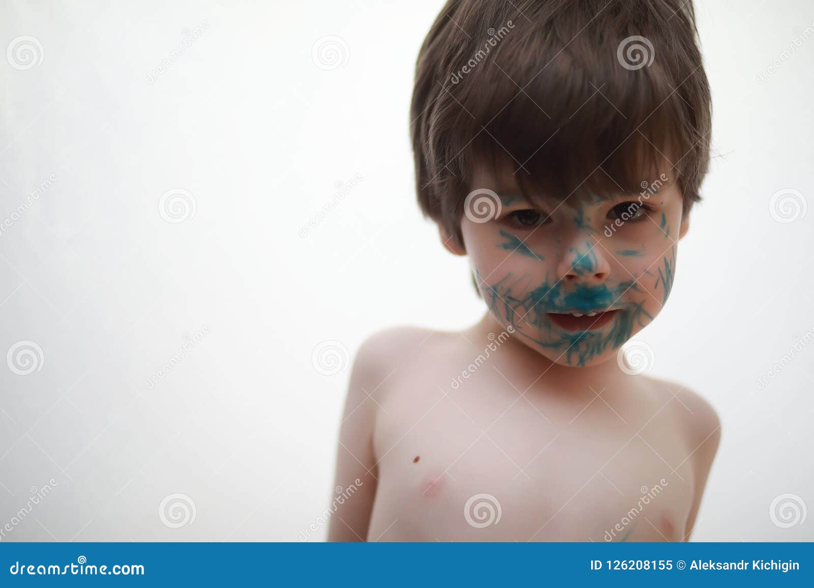 A Child Painted His Face with Colors Stock Image - Image of curly ...