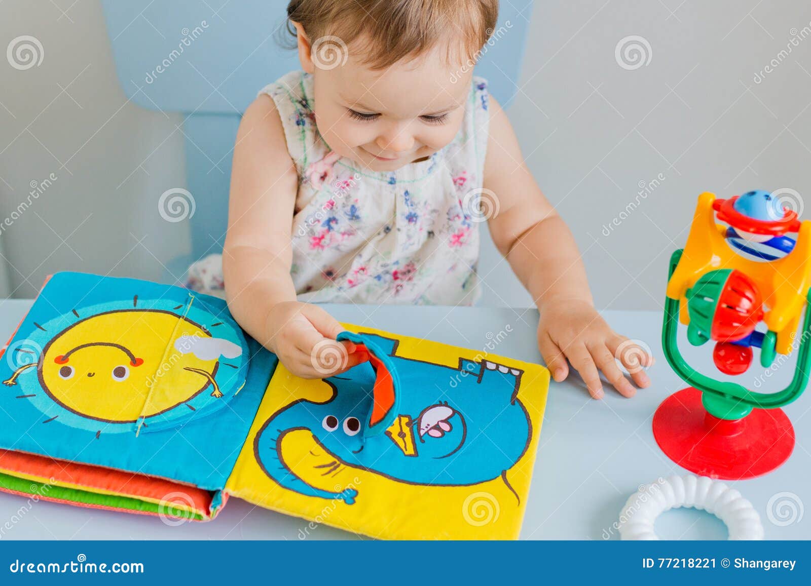 Small Child Playing with Soft Book Stock Image - Image of indoors ...