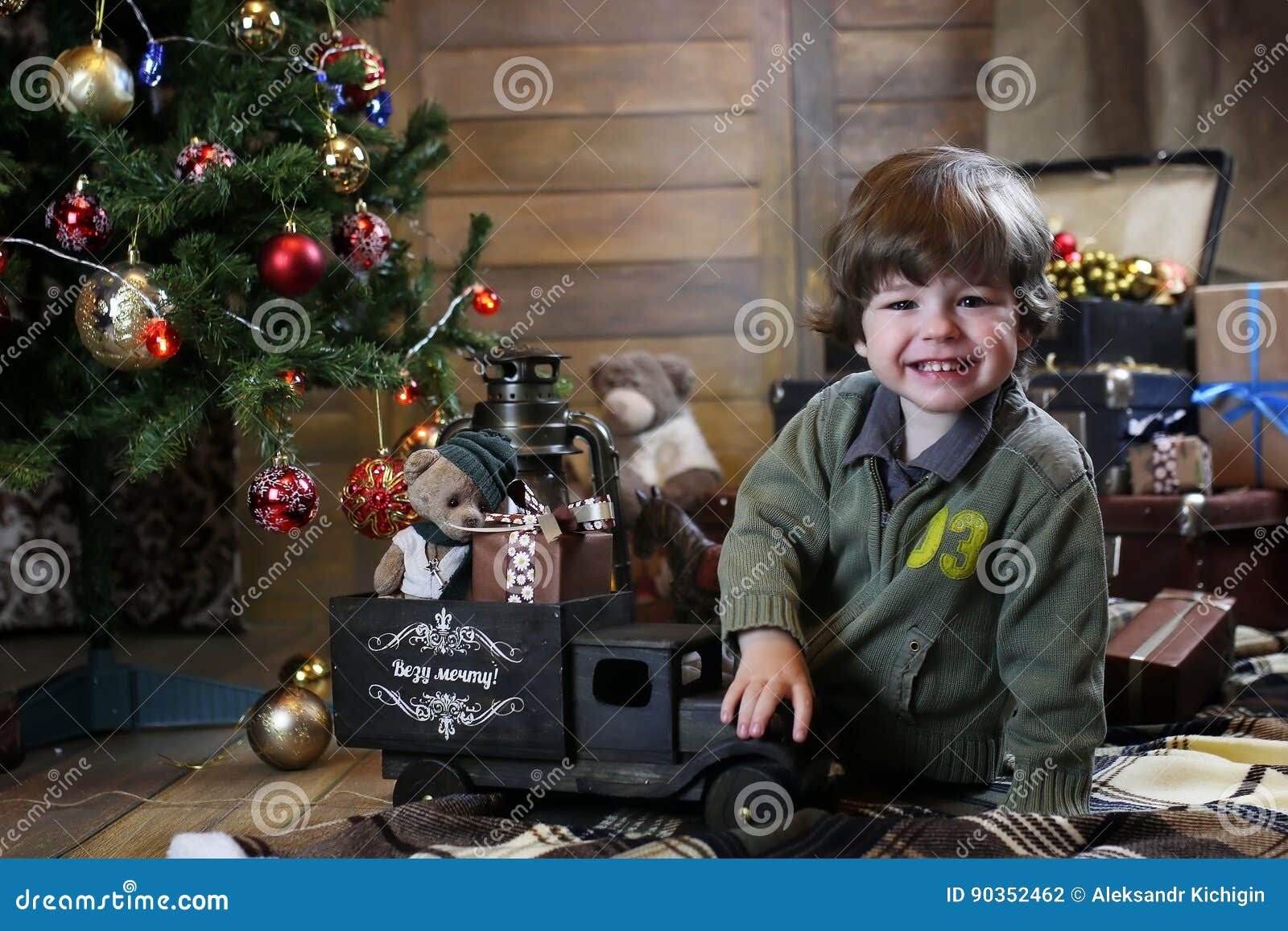 Small Child Playing with Toys with Christmas Decorations Stock Photo ...