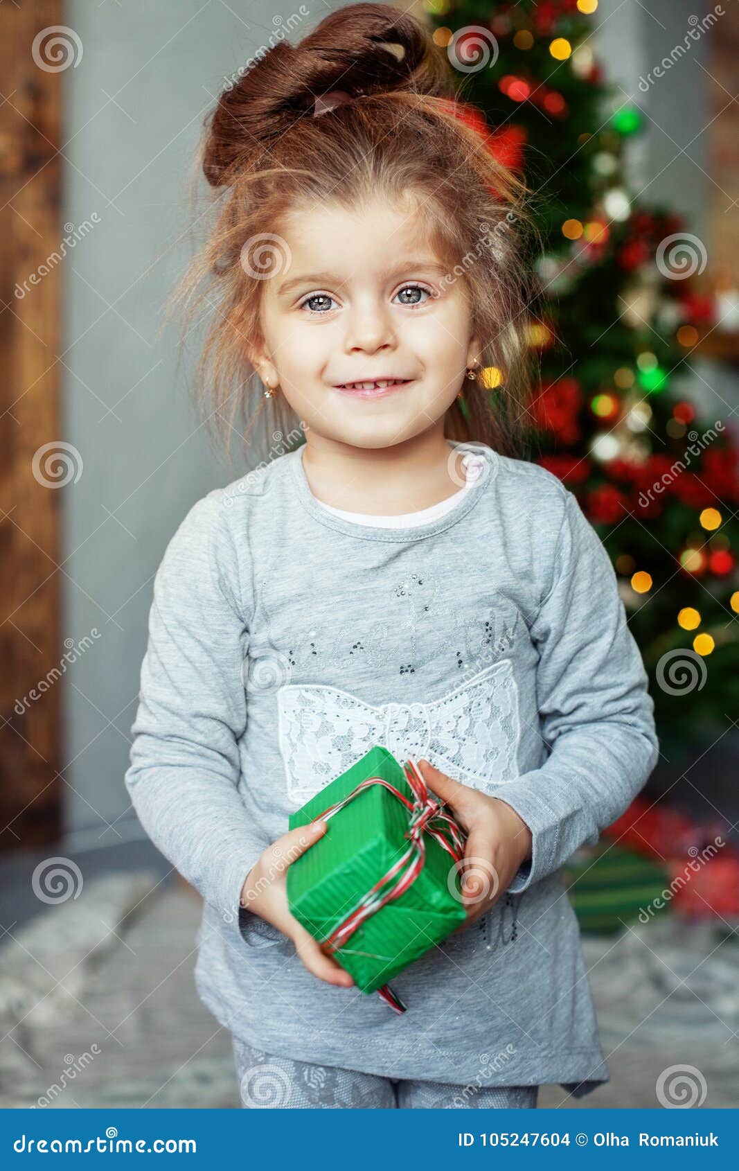 Small Child with a Present. the Concept of Christmas. Stock Photo ...