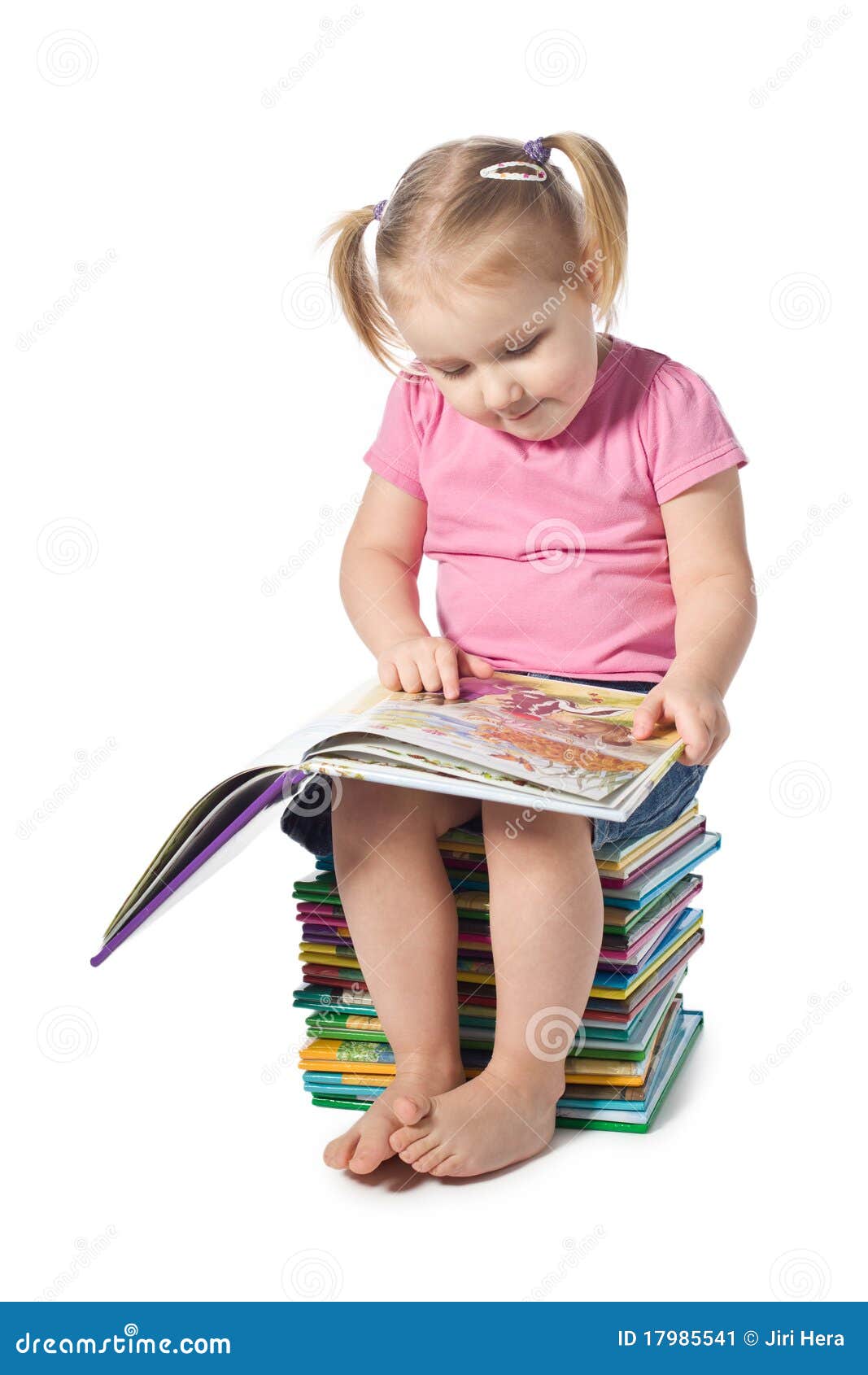 Small child reading a book stock image. Image of child - 17985541