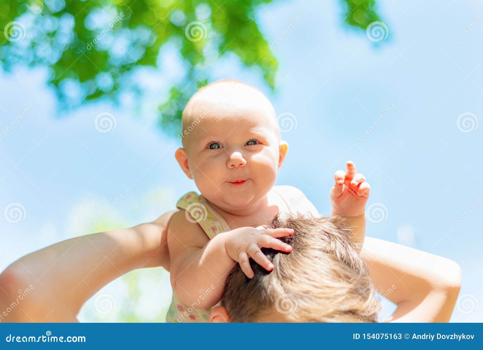 A Small Child is Sitting on His Father`s Neck Stock Image - Image of ...