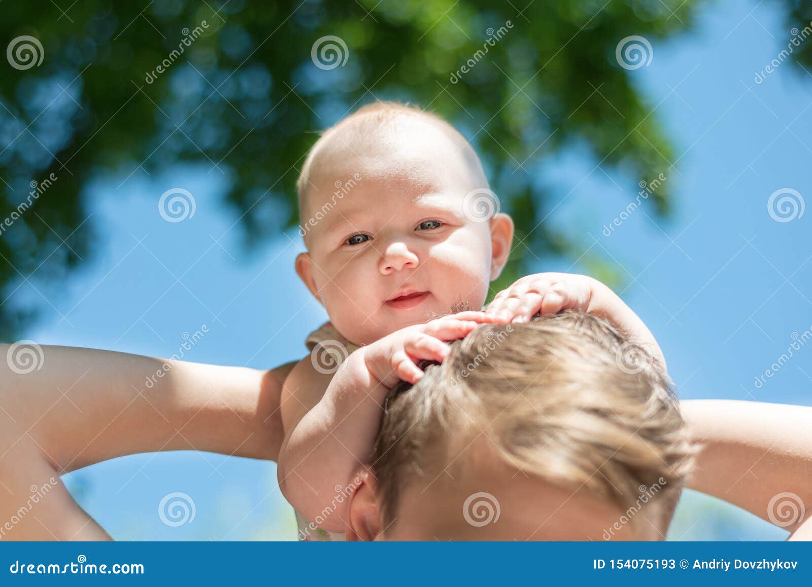 A Small Child is Sitting on His Father`s Neck Stock Image - Image of ...