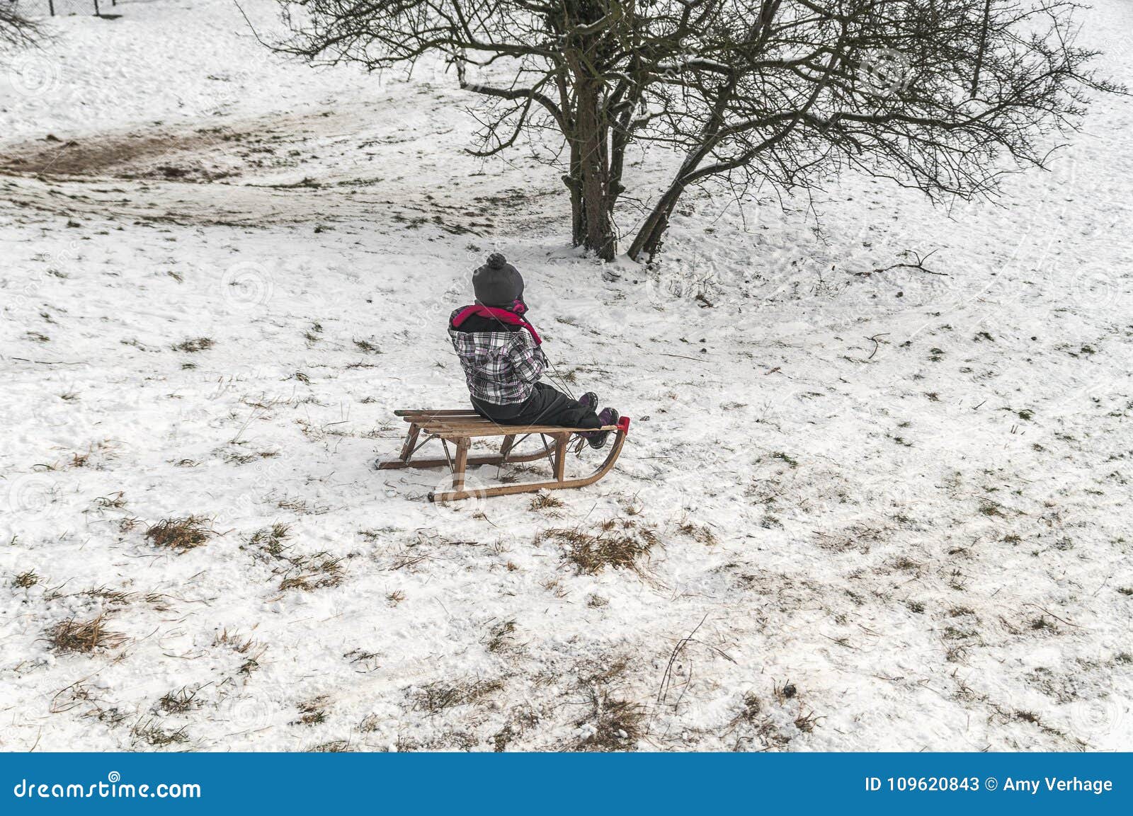 Child Playing in the Snow with a Sledge Editorial Stock Photo - Image ...