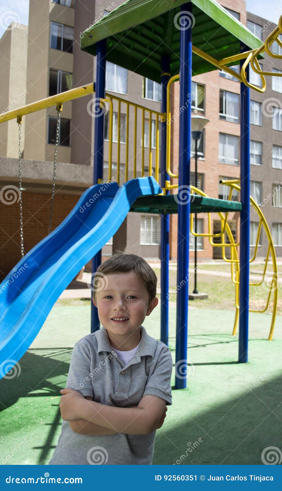 Small child on slide. stock image. Image of area, childhood - 92560351
