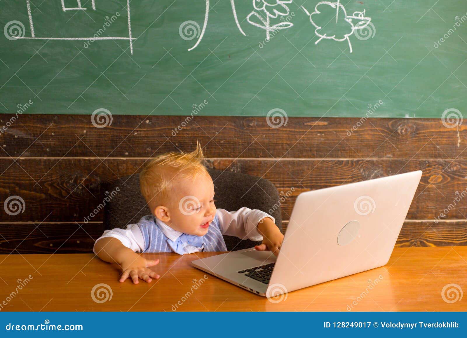 Small Child Work on Education Computer Laptop in School Classroom ...