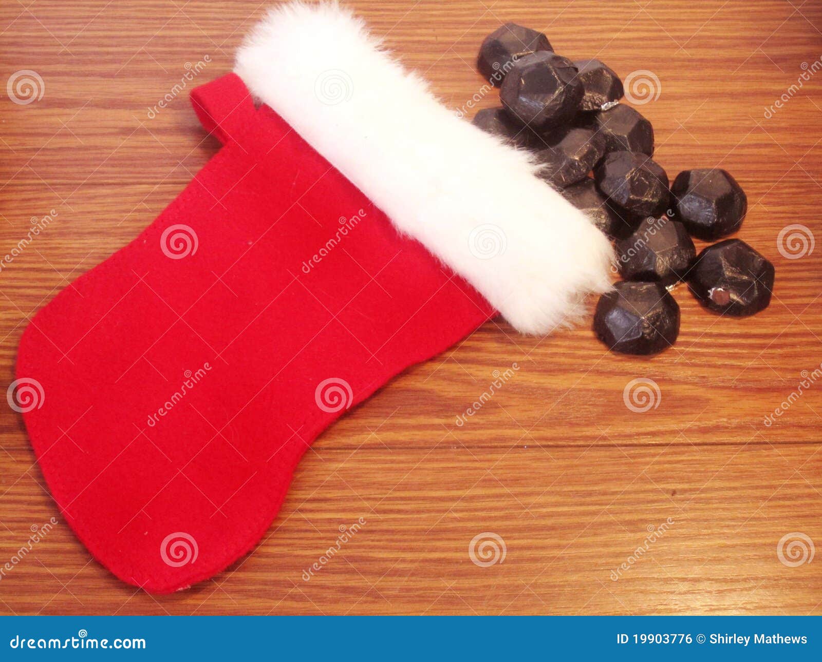 Small Childs Christmas Stocking With Coal Picture. Image: 19903776