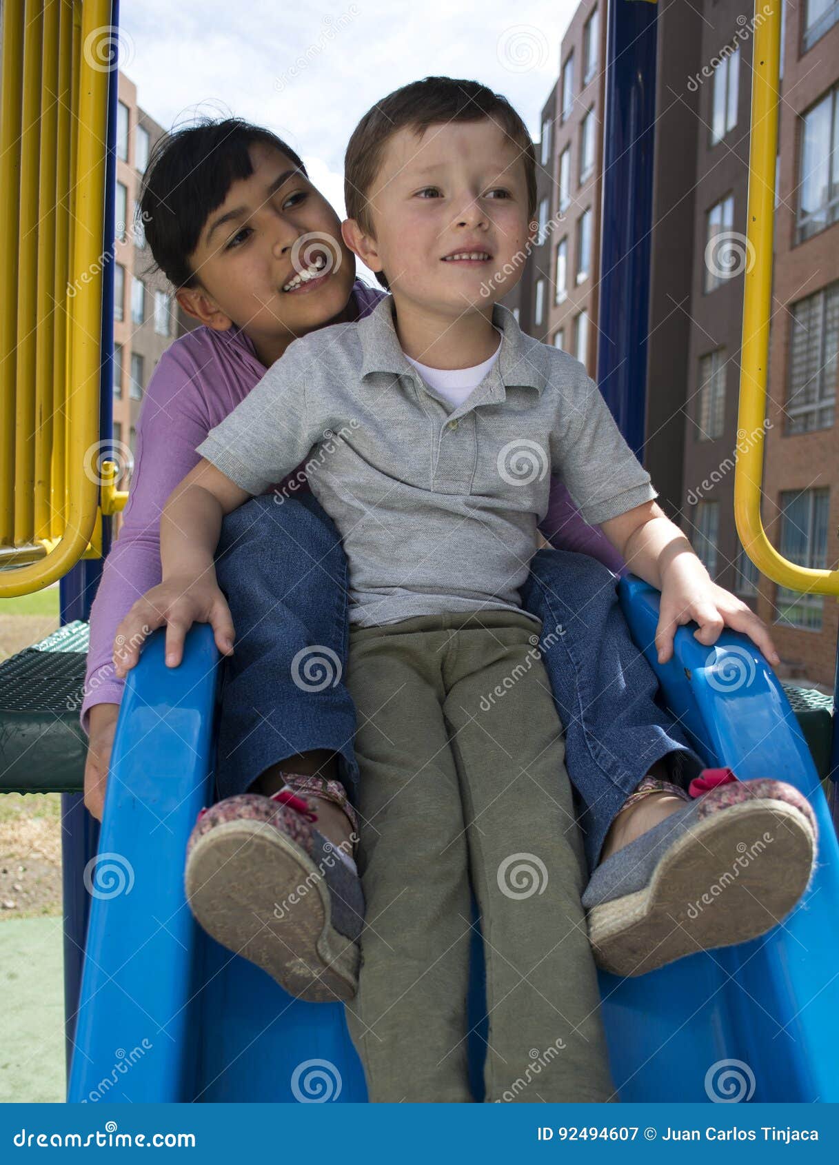 Small childs on slide. stock image. Image of colombian - 92494607