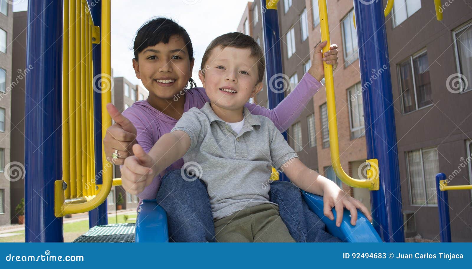 Small childs on slide. stock image. Image of home, laughing - 92494683