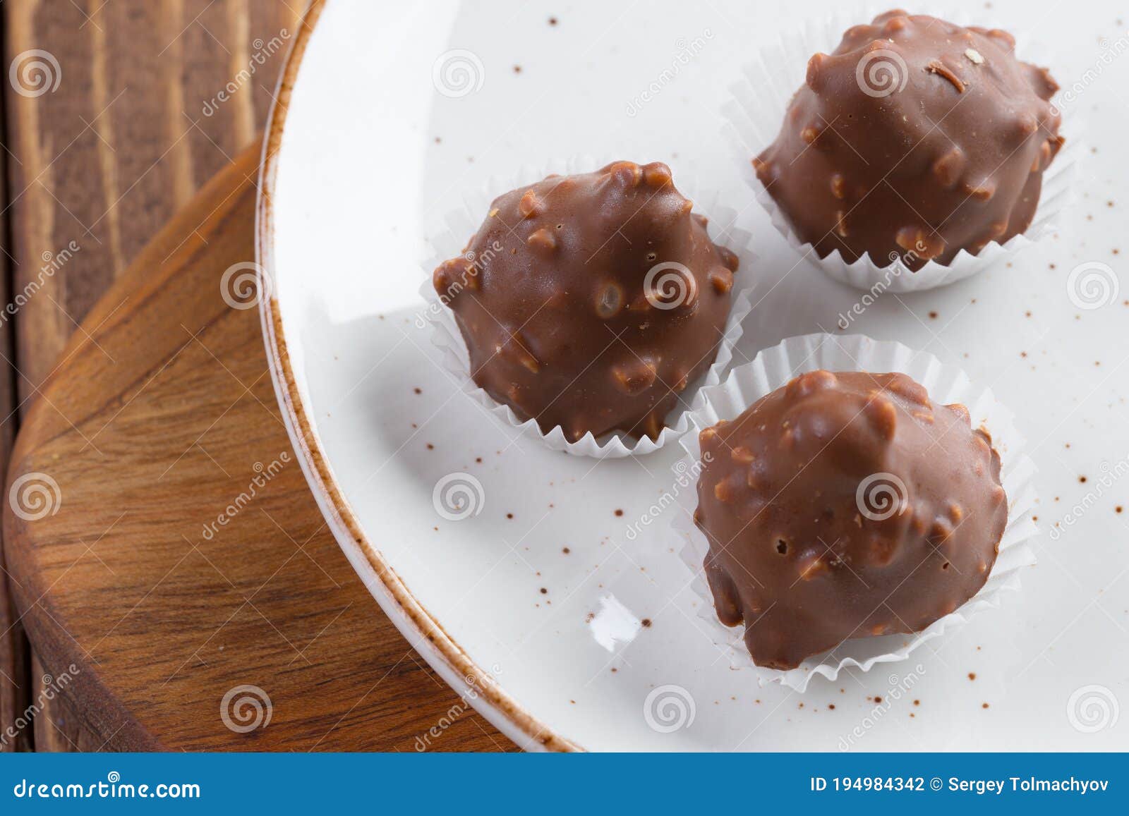Small Chocolate Sweets with Nuts Close Up Stock Photo - Image of ...