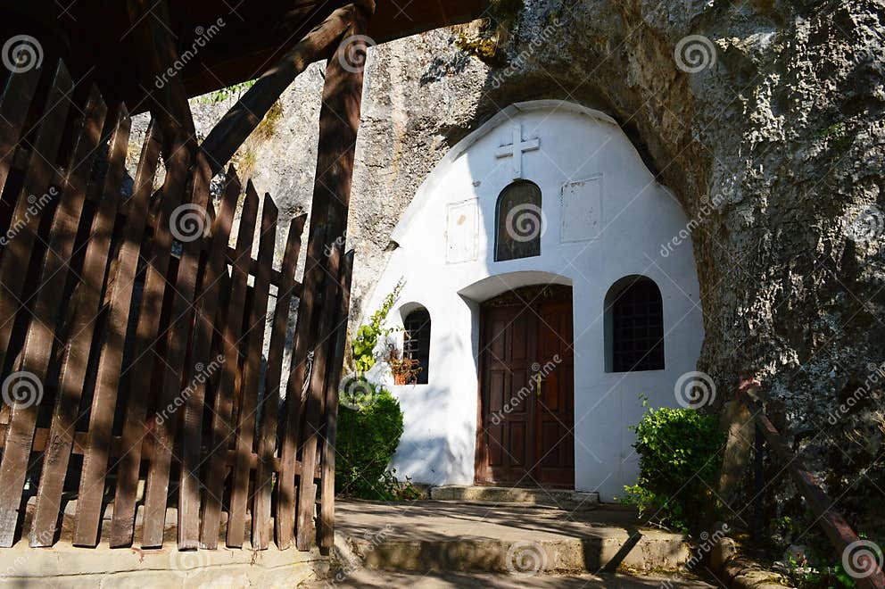 Small church in a cave stock photo. Image of cross, cave - 346811120