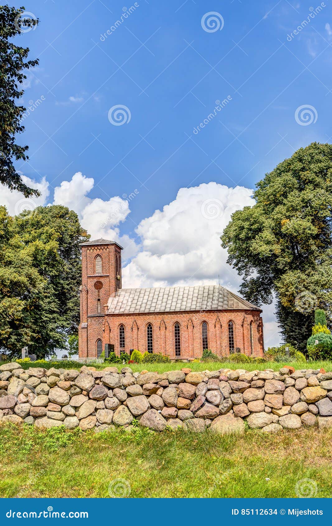 Small church in Mirow stock photo. Image of clay, facade - 85112634