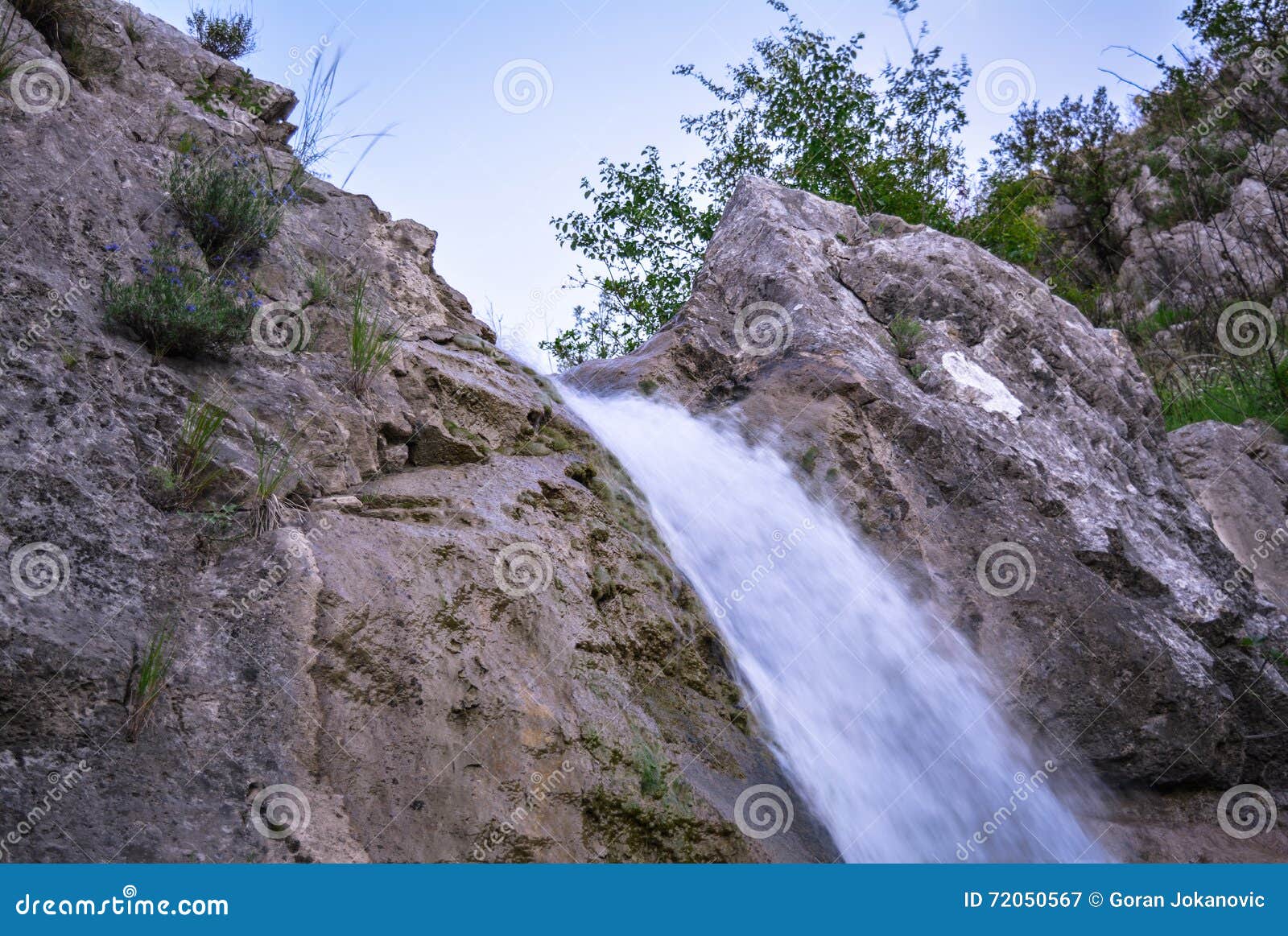 Small clean waterfall stock image. Image of falling, blue - 72050567
