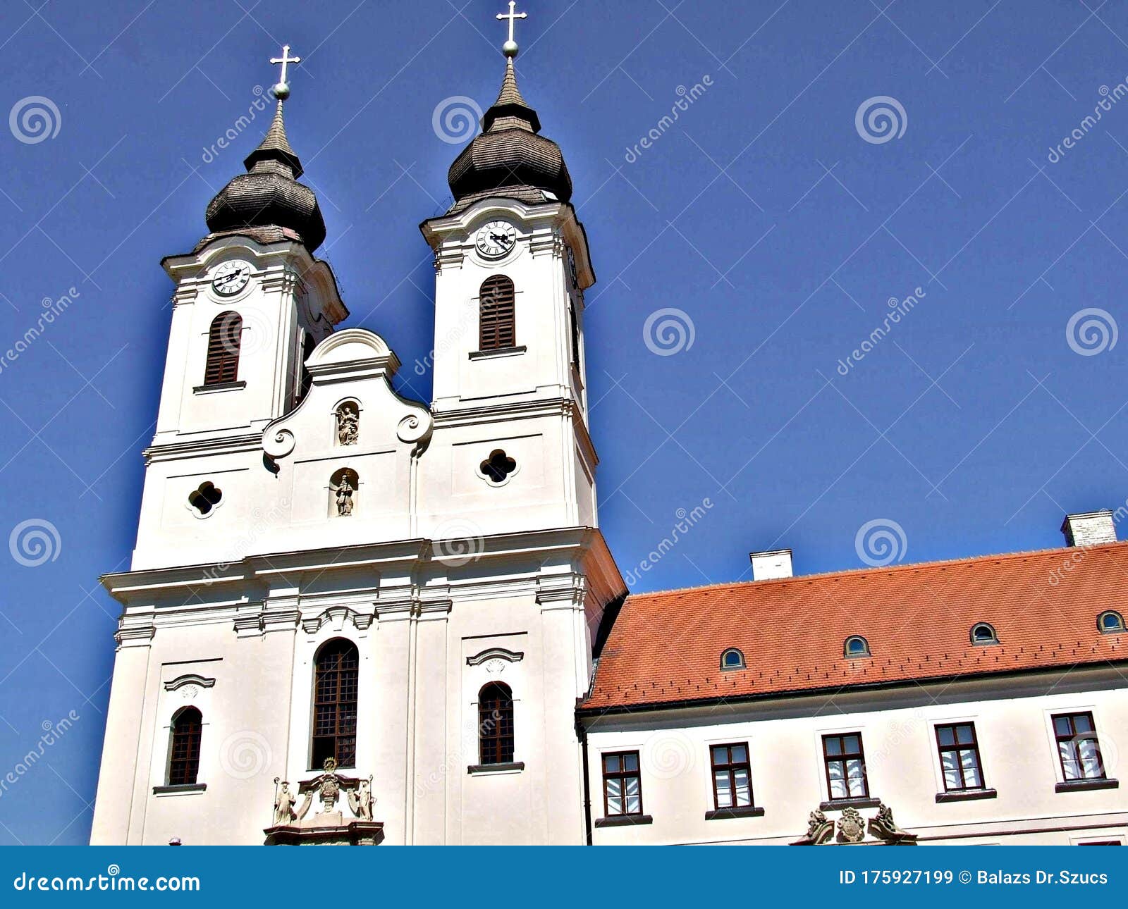 A Small Clock Tower in Front of a Building Stock Image - Image of ...