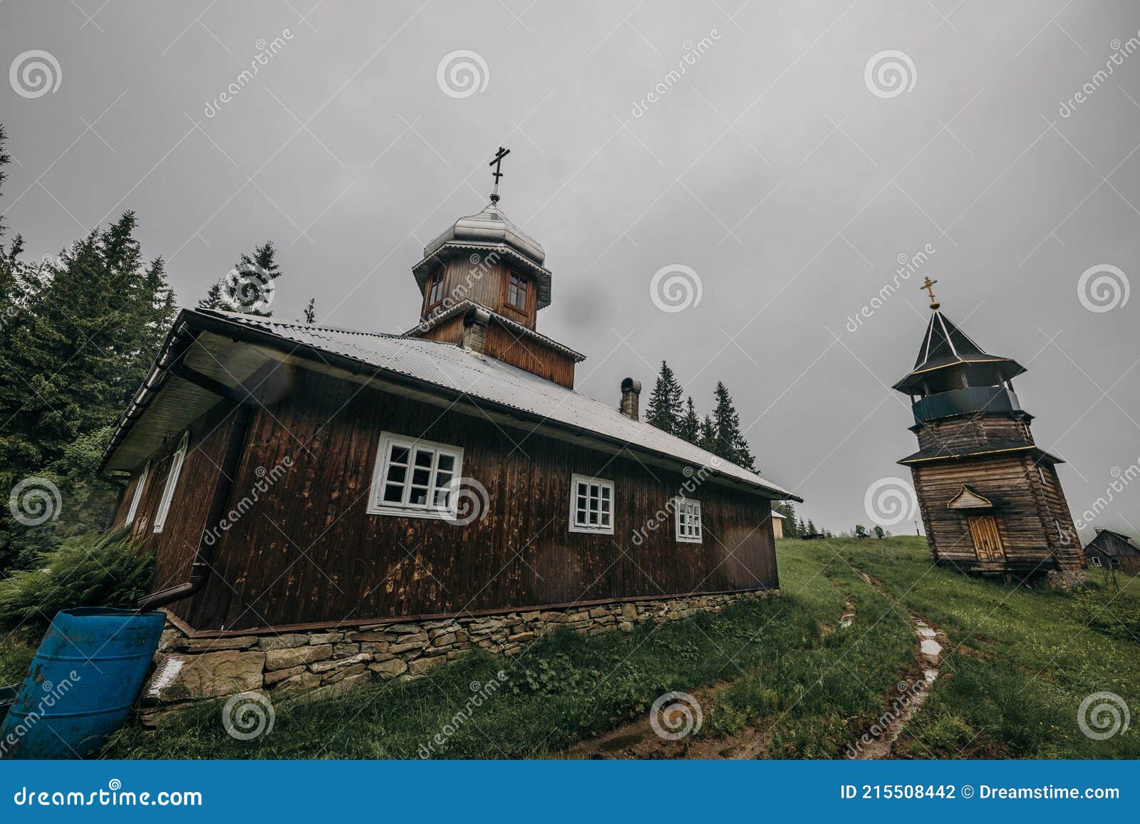 A Small Clock Tower in Front of a House Stock Photo - Image of climb ...