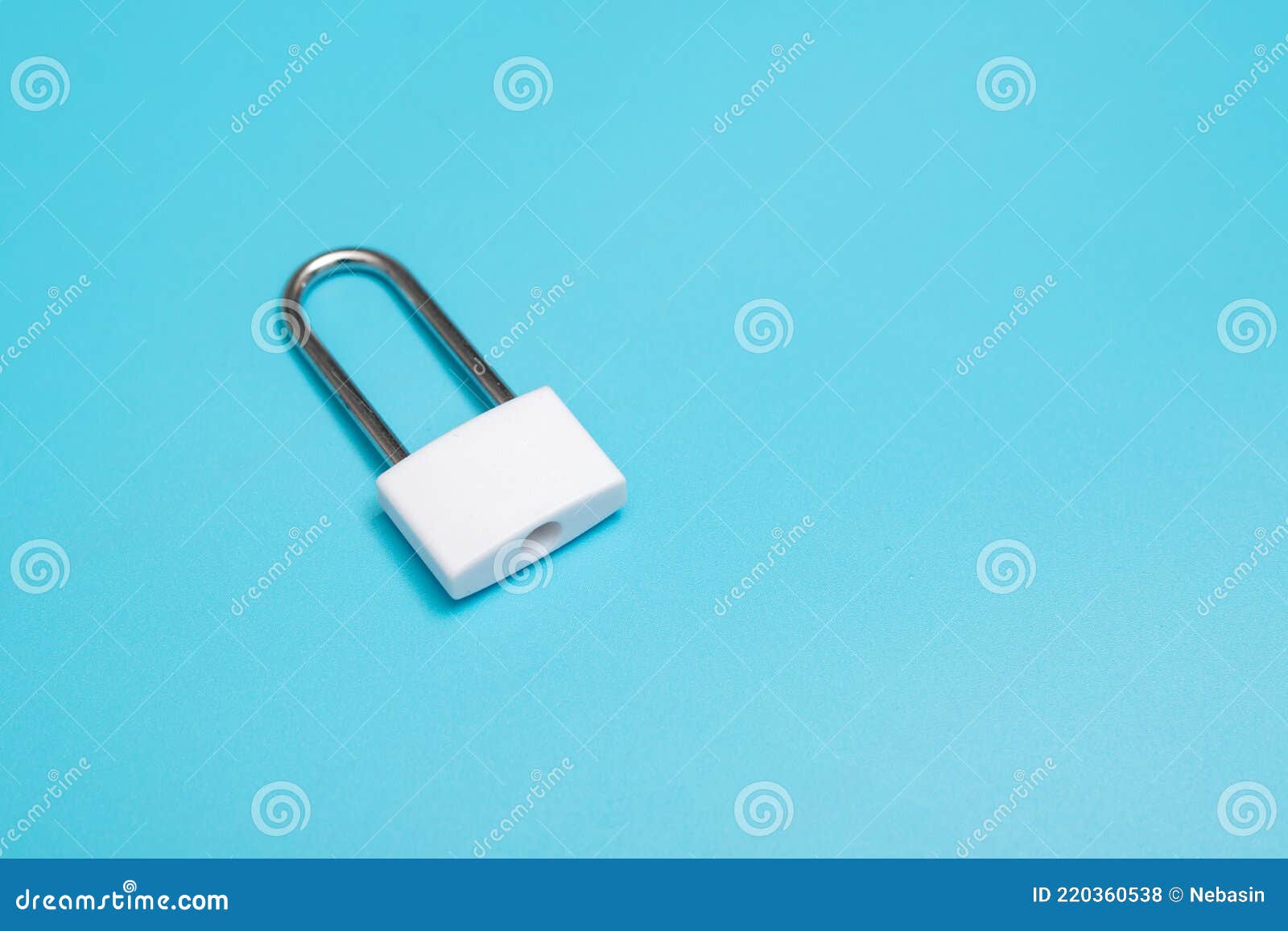 Small Closed White Padlock on a Blue Background Stock Photo - Image of ...