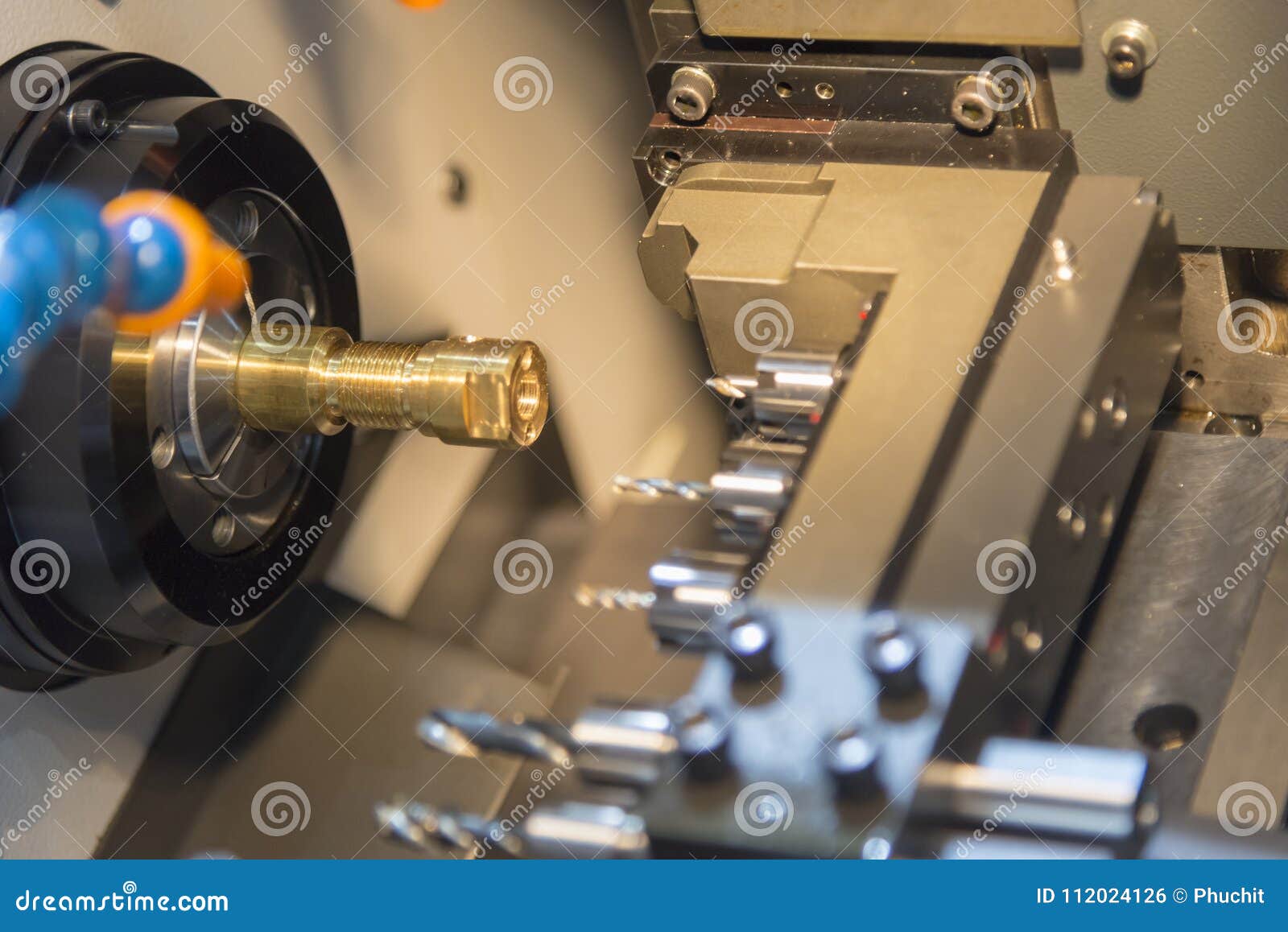 The Small CNC Lathe Cutting the Brass Shaft Stock Photo - Image of ...