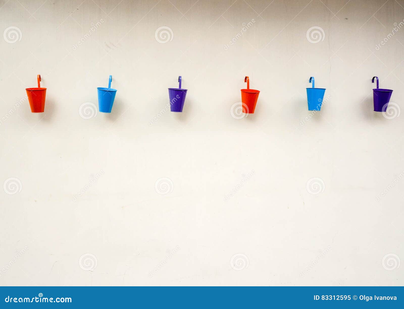 Small Color Buckets on Wall Background Stock Image - Image of buckets ...