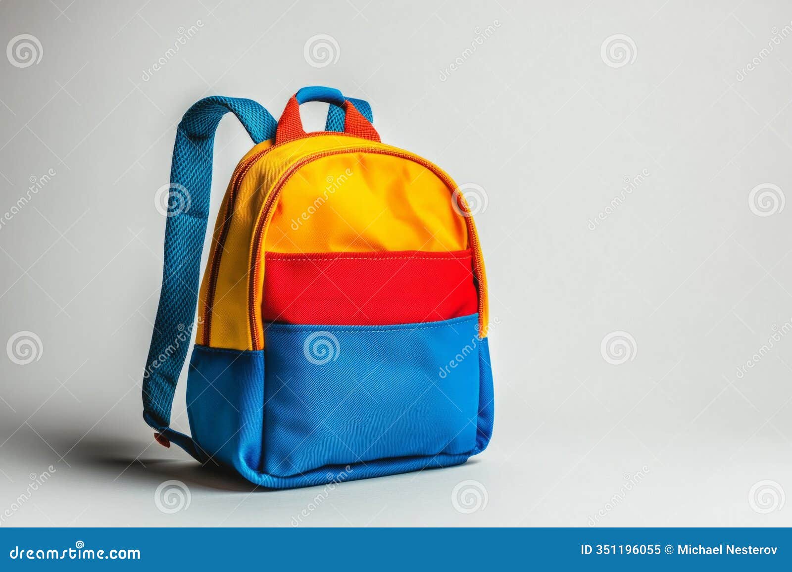 Small Colorful Backpack Standing on a White Background, Ready for ...