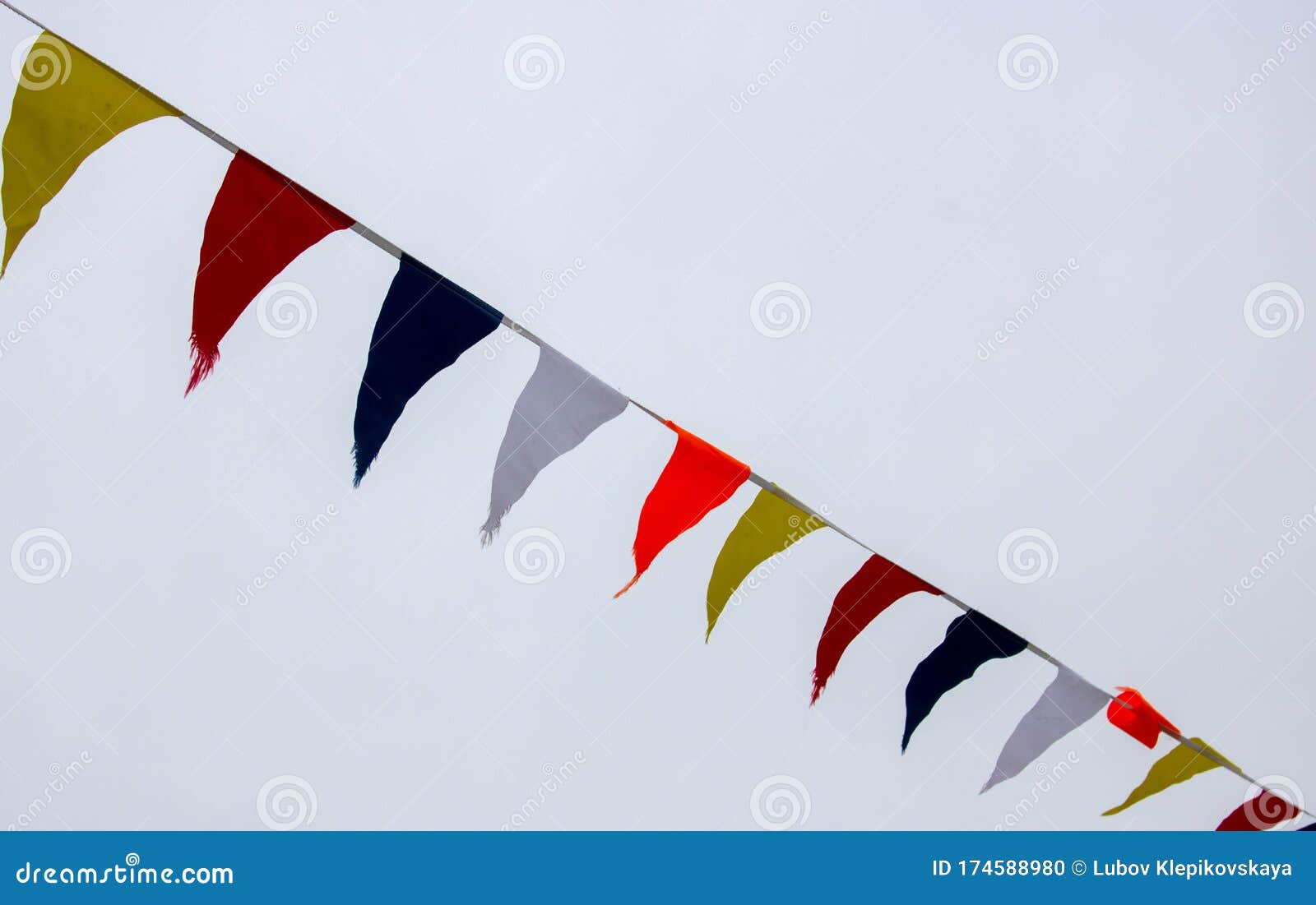 Small Colorful Flags in the Gray Sky Stock Photo - Image of decoration ...