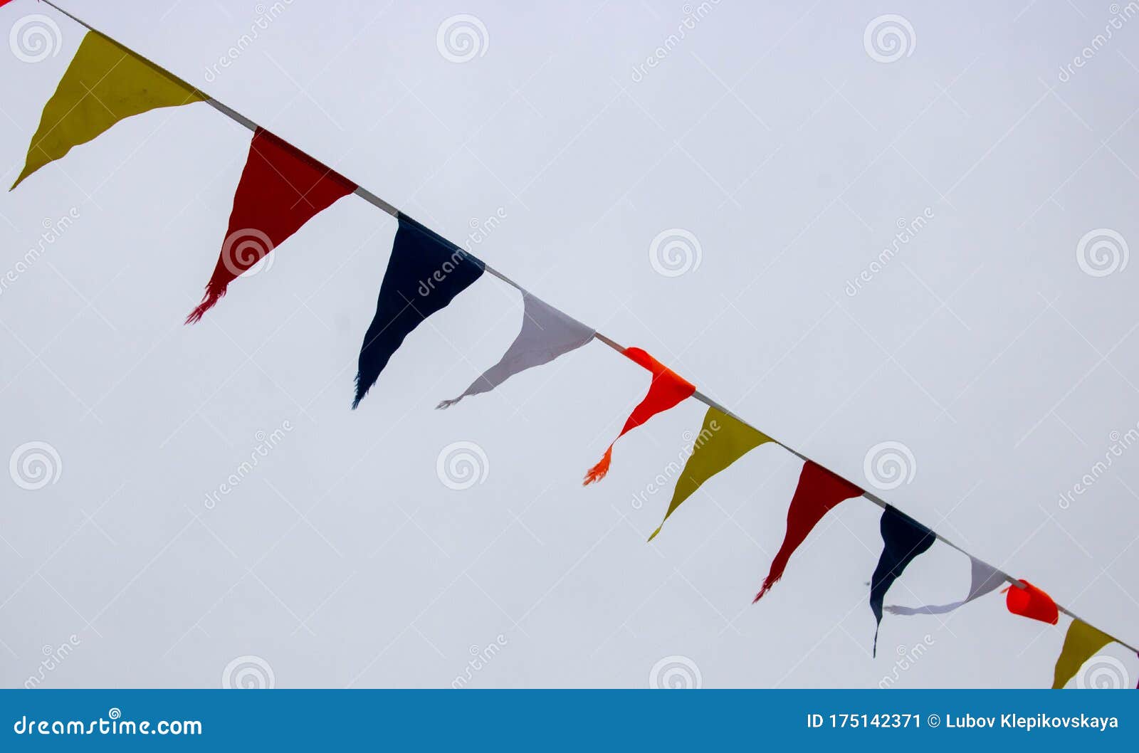 Small Colorful Flags in the Gray Sky Stock Image - Image of wave, grey ...