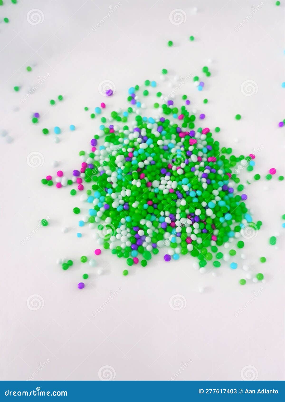 Small Colorful Granular Objects on a Black Background Look Adorable and ...