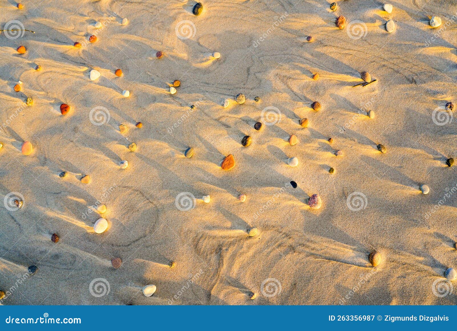 Small Colorful Pebbles in the Beach Sand, Interesting Sand Structure ...