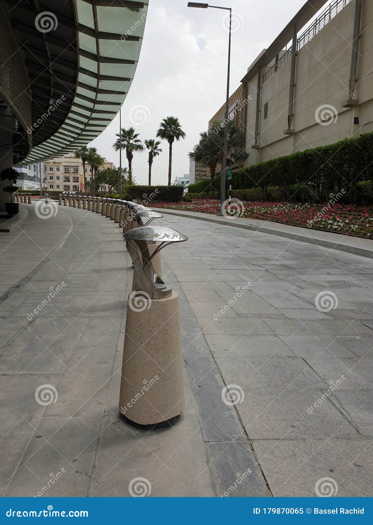 Small Columns Stacked on the Sidewalk Next To One of the Buildings ...