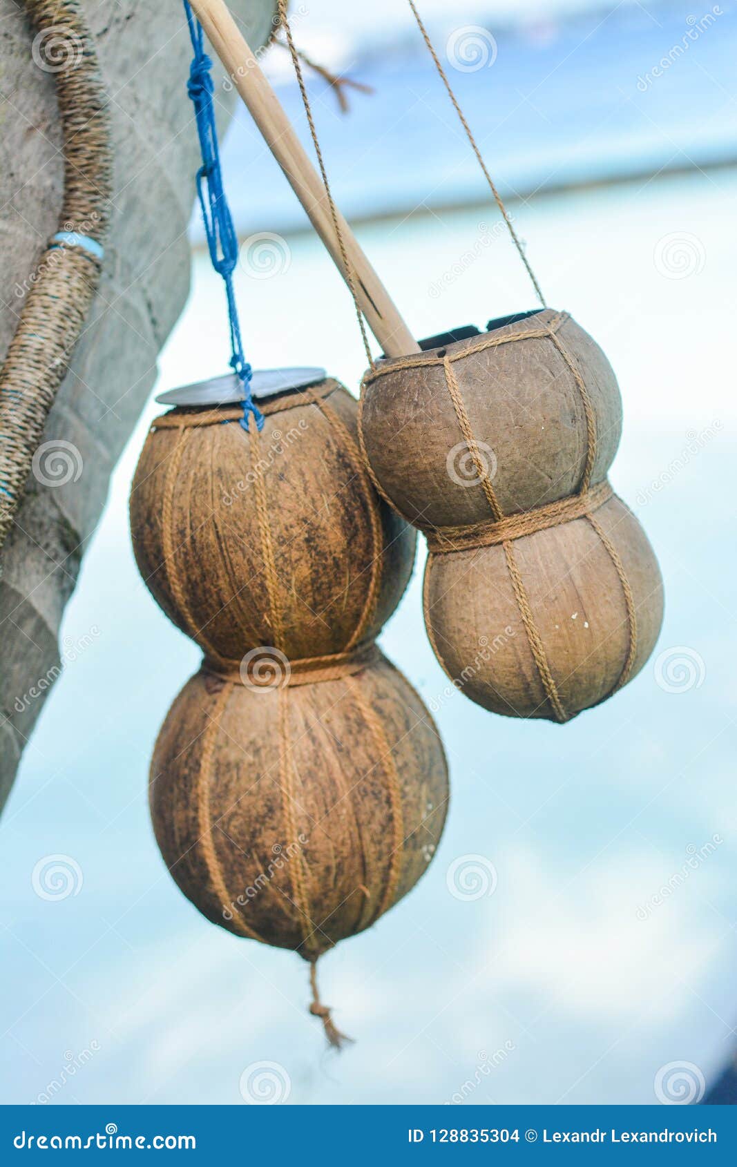 Small Containers with Ropes Made from Coconut Shells Stock Photo ...