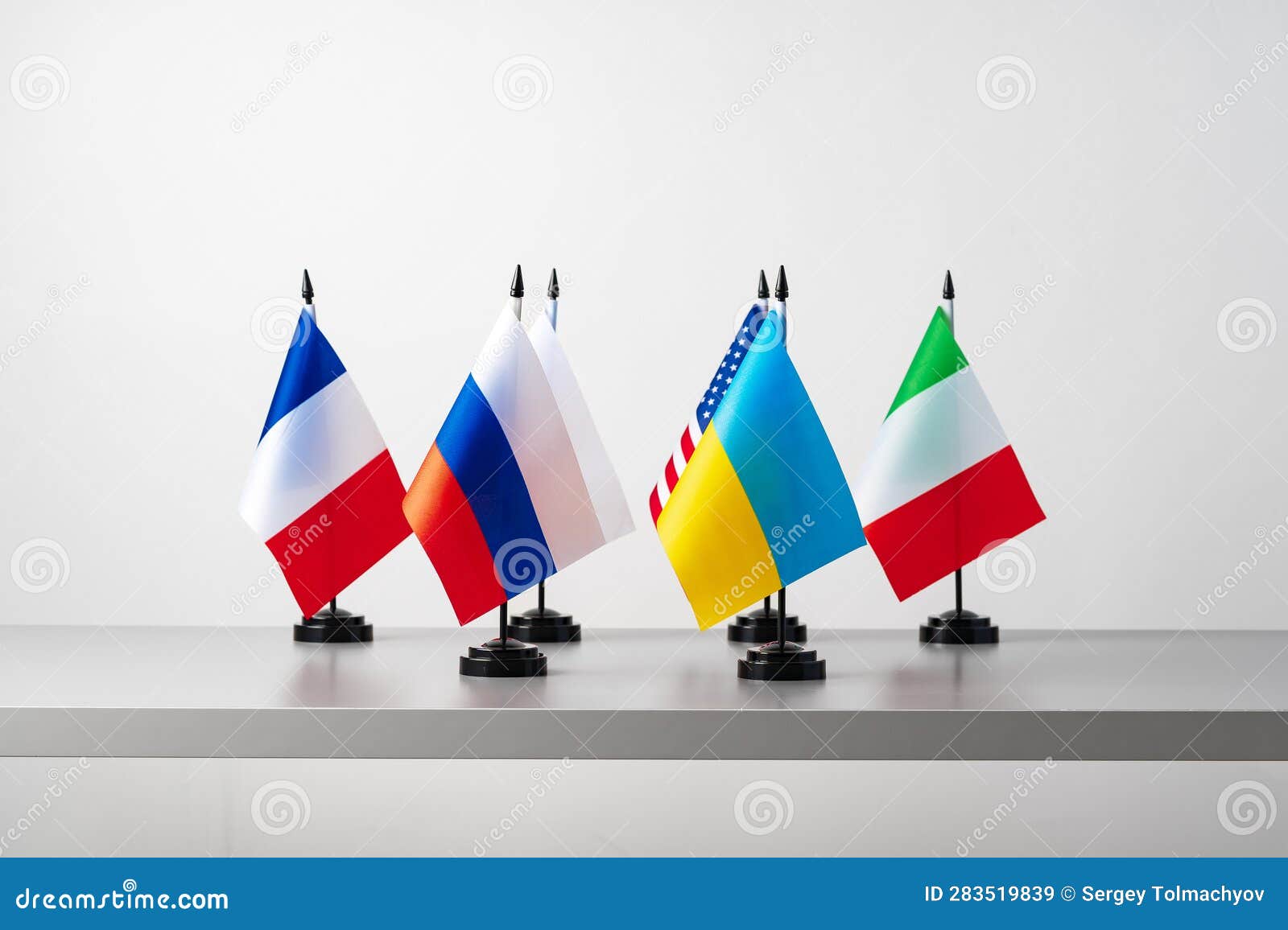 Small Country Flags Standing at a Table Stock Image - Image of element ...