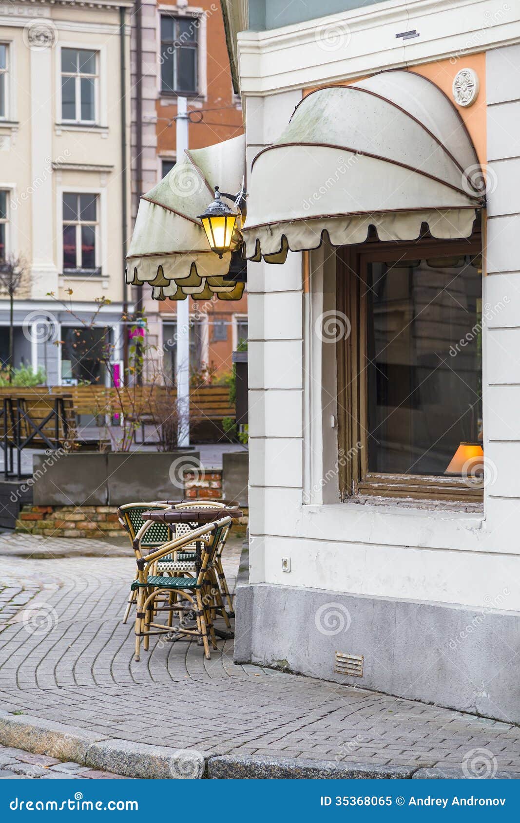 A Small Cozy Cafe on the Corner of the Street Stock Image - Image of ...