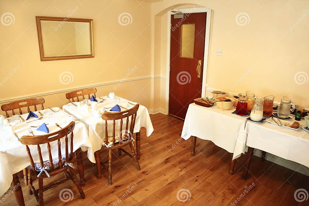 Small, Cozy Restaurant with Food on Table Stock Image - Image of couch ...