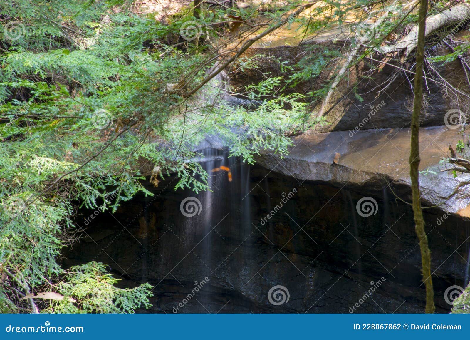 Large Pool of Water at Base of Cliff Stock Photo - Image of cave, large ...