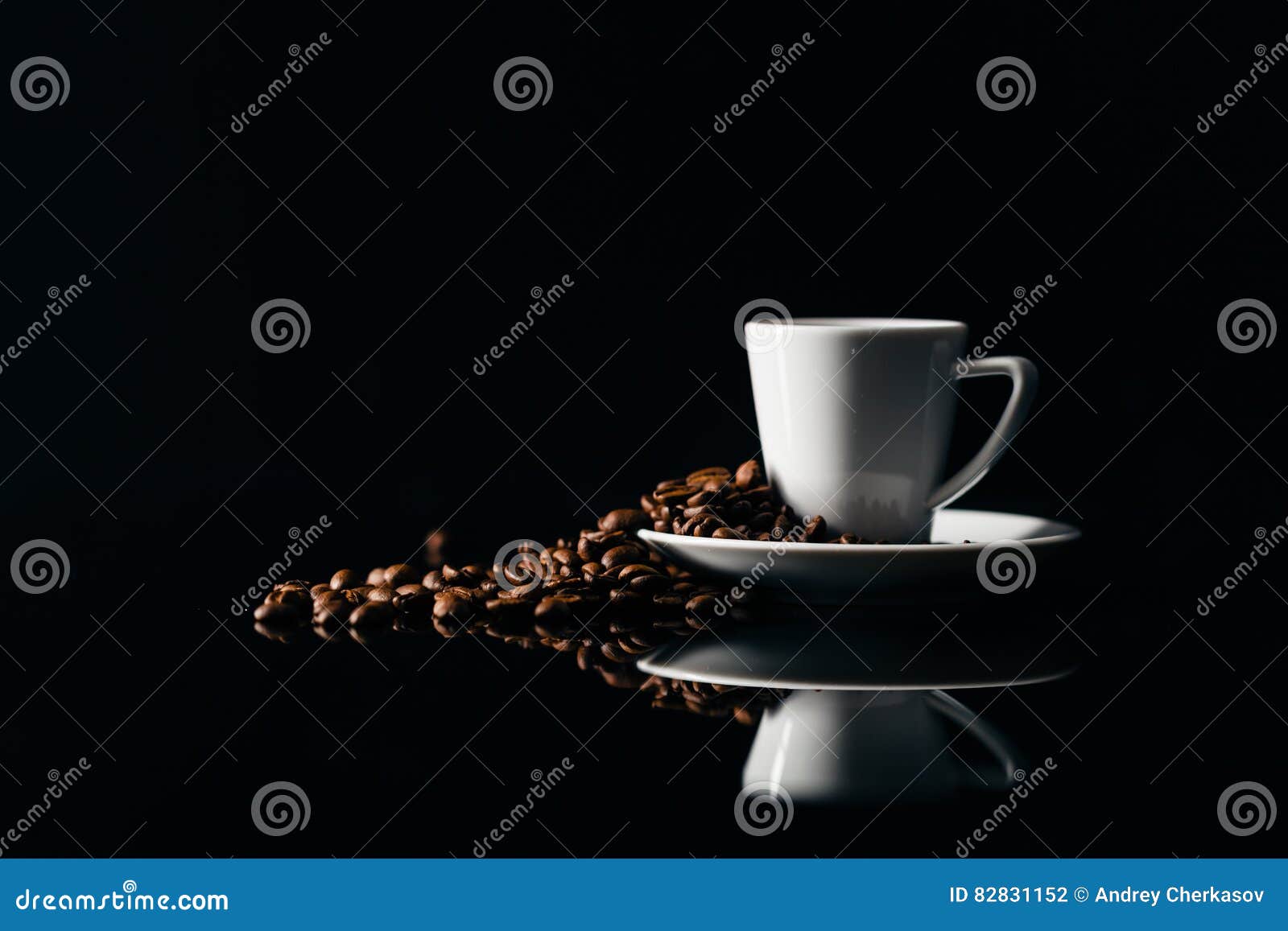 Small Cup Of Black Coffee On A Dark Background With Coffee Beans Stock ...