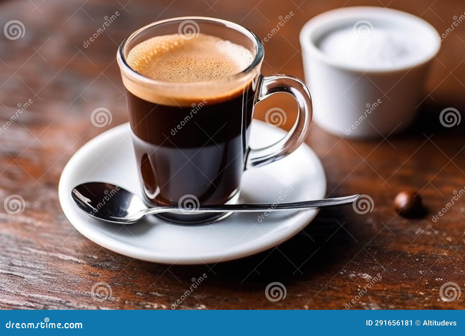 A Small Cup of Coffee Next To a Sugar Packet Stock Image - Image of ...
