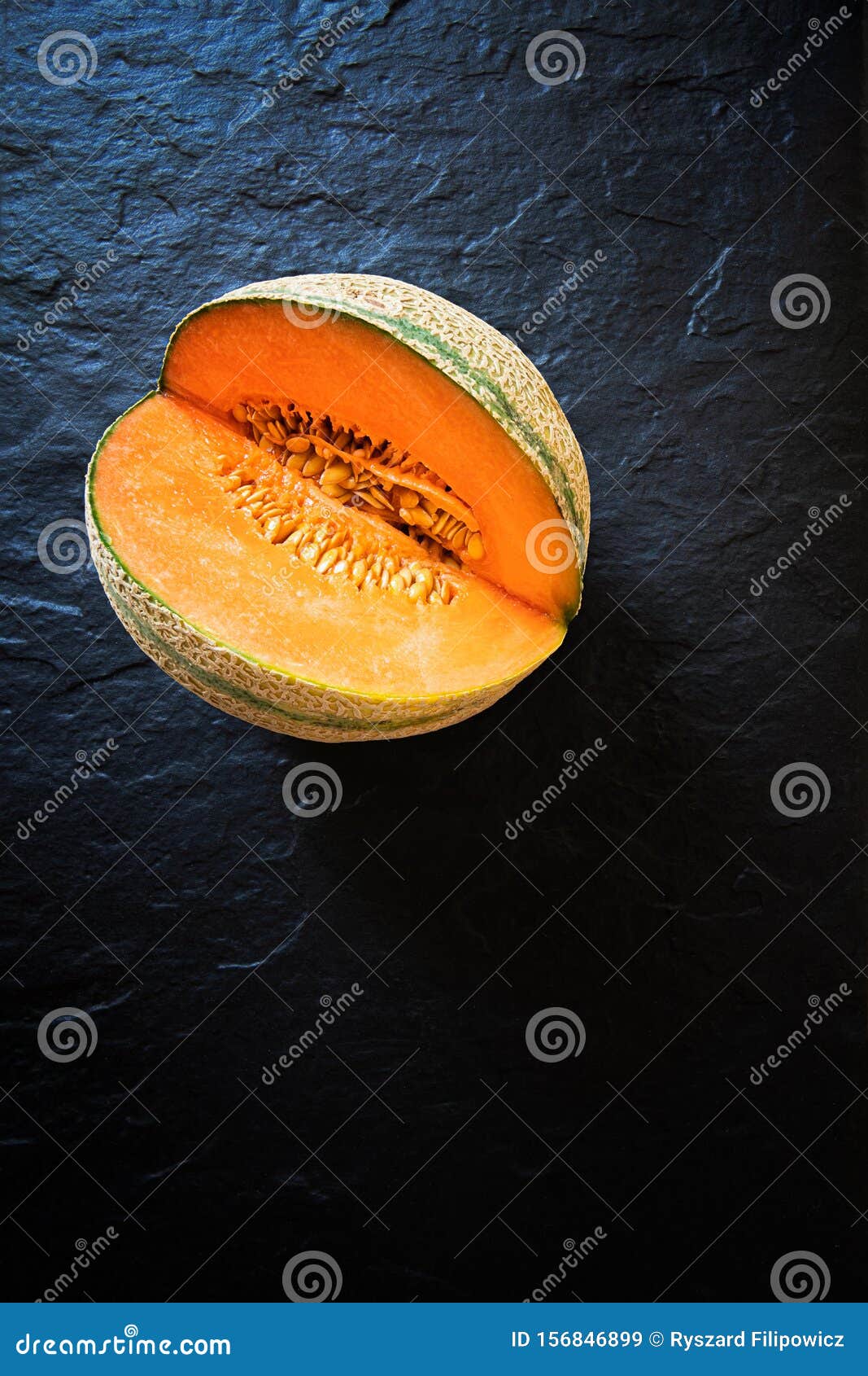 Small, Cut Melon Lying on a Stone Slab. Stock Image - Image of organic ...