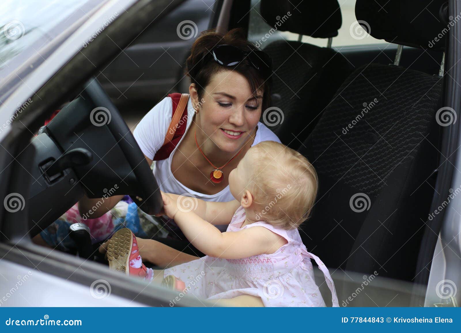 Small Cute Baby and Mom in a Car Stock Image - Image of small, nice ...