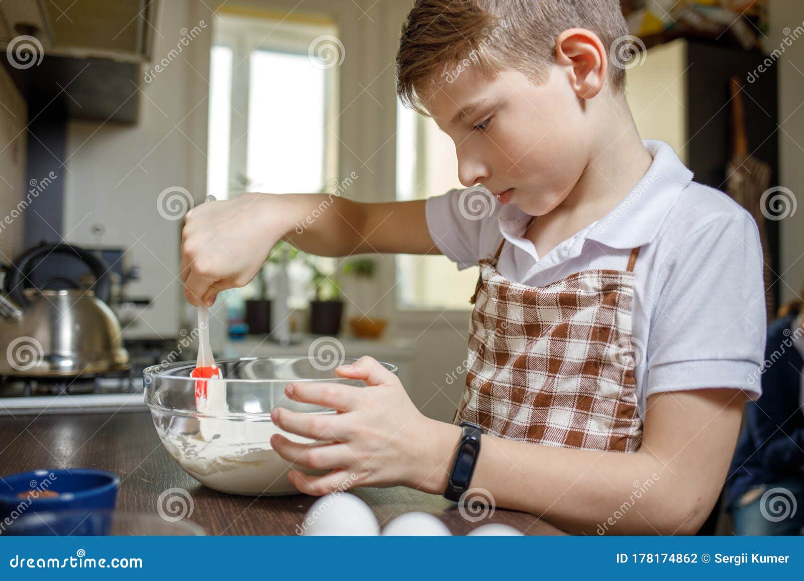 Small Cute Boy Cooking Dessert on the Kitchen Stock Photo - Image of ...
