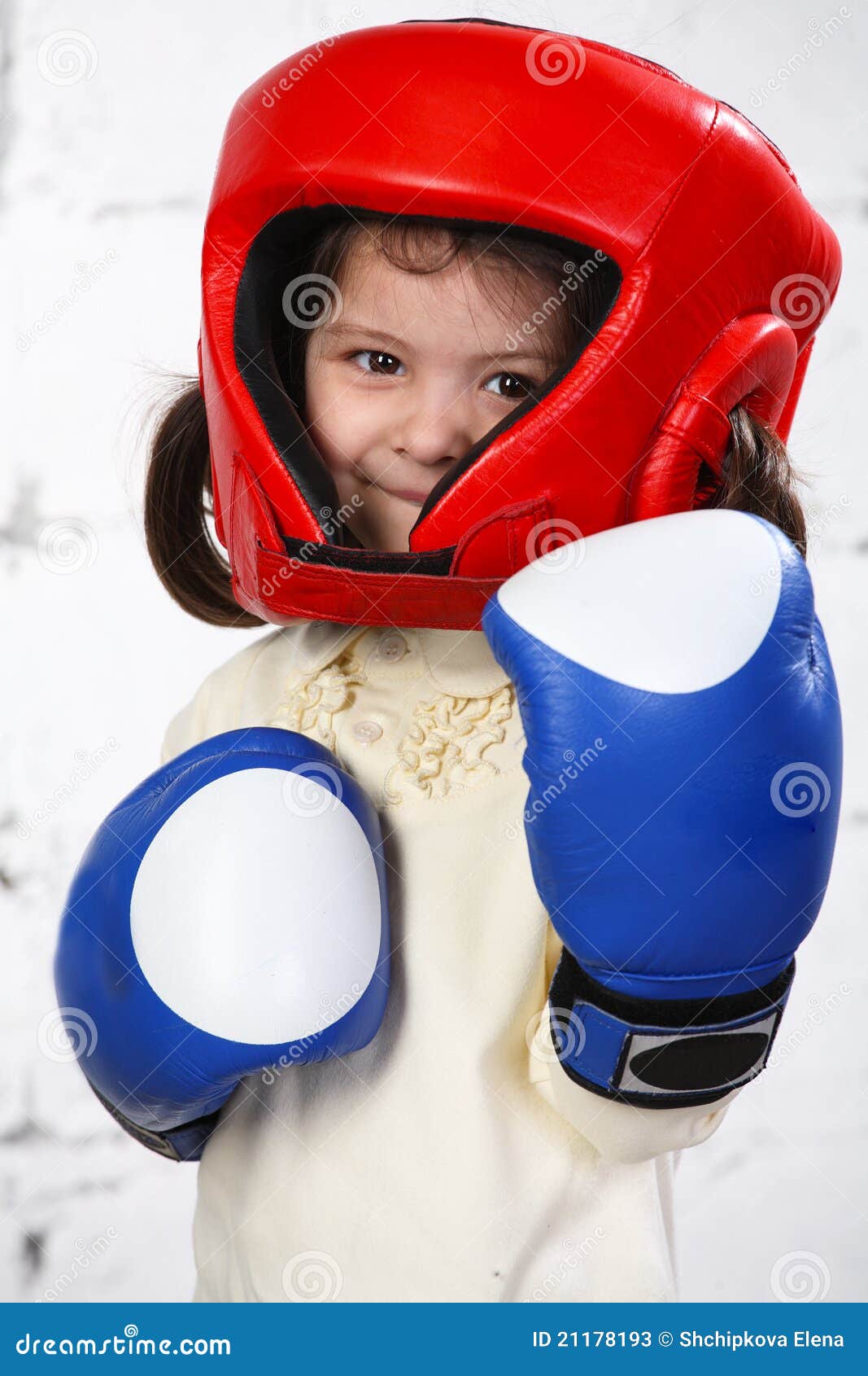 Small Dark-haired Girl in a Protective Helmet and Stock Image - Image ...