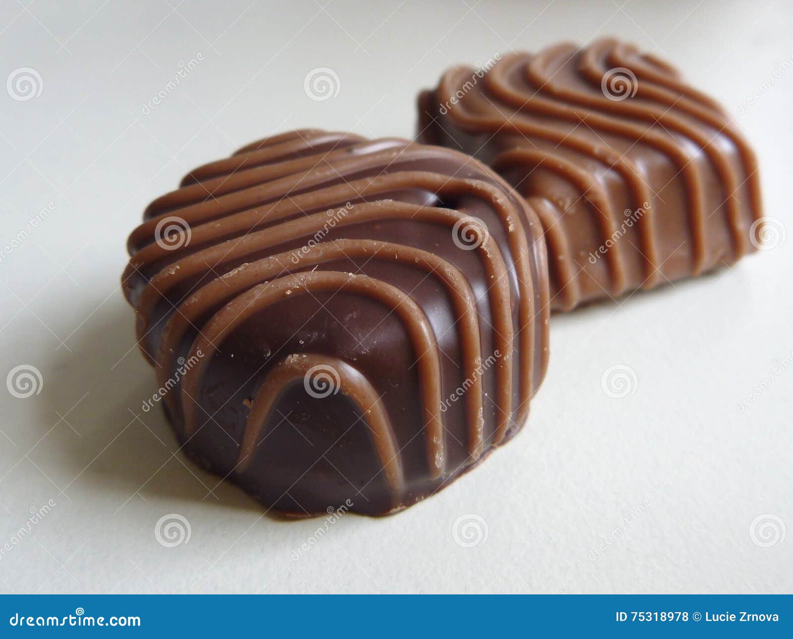 Small Decorated Brown Chocolate Candy Stock Photo - Image of split ...