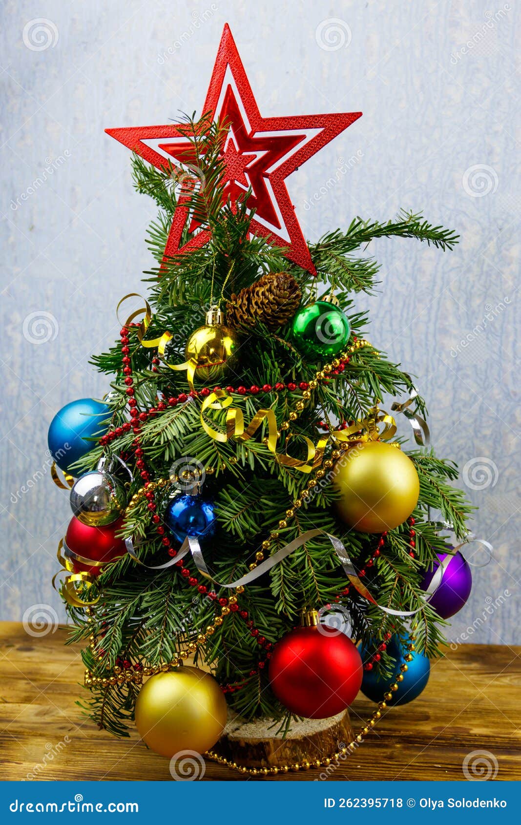 Small Decorated Christmas Tree on Table in a Room Stock Photo - Image ...