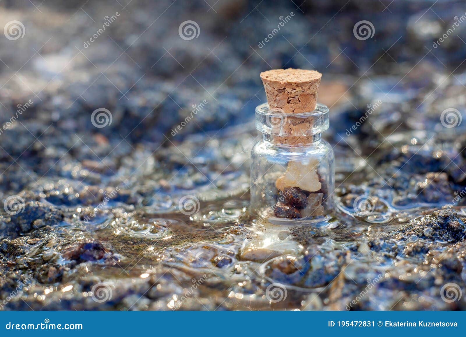 A Small Decorative Jar with Stones Inside is in the Stream. Jar with a ...