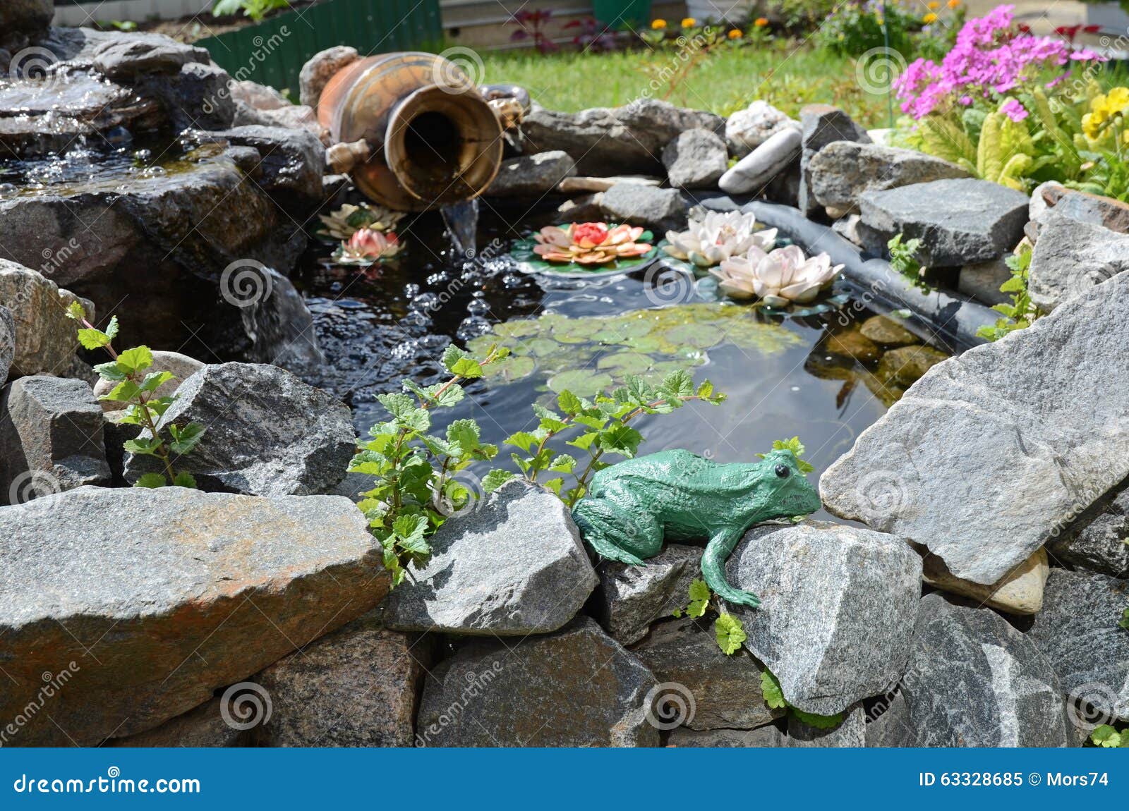 Small Decorative Pond in the Garden. Landscape Design Stock Image ...