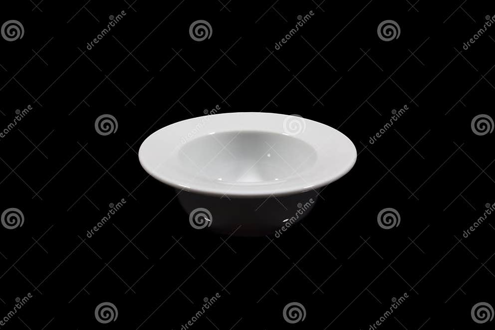 Small Deep Plate on Black Background from Side Stock Image - Image of ...