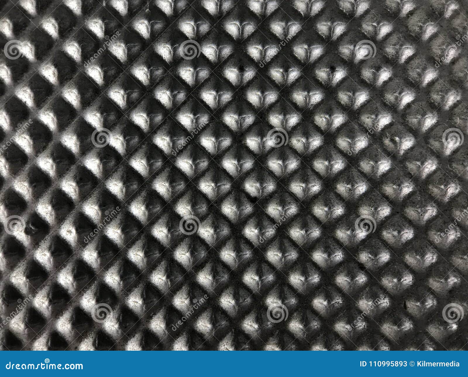 Small Die-cast Pyramids on a Metal Sheet Up Close Stock Image - Image ...