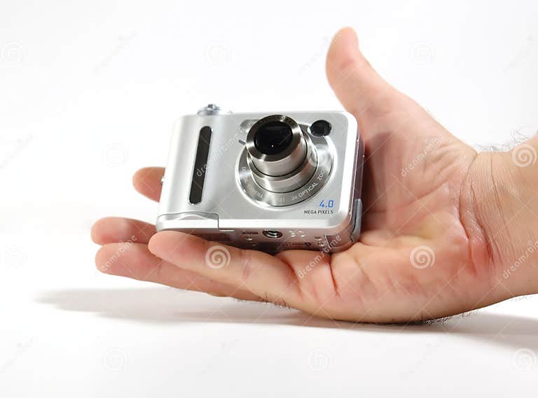 Small digital camera stock photo. Image of camera, hand - 193372