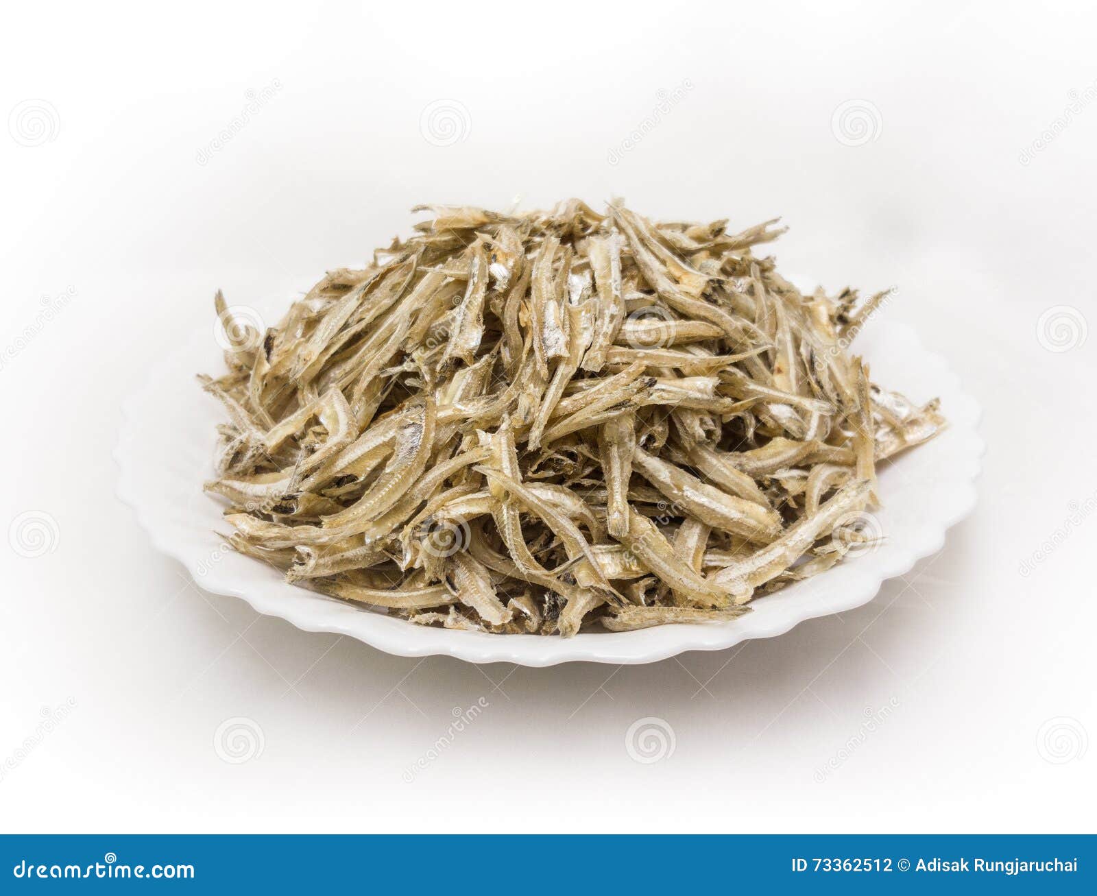 Small Dried Fish in Dish on a White Background Stock Photo - Image of ...