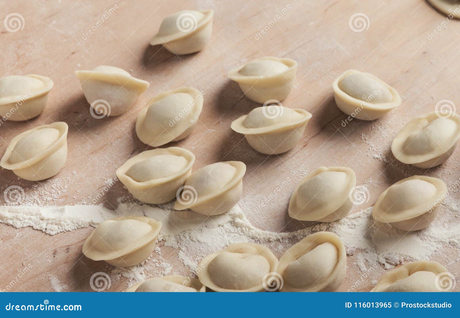 Small Dumplings with Meat on the Table with Flour Stock Image - Image ...