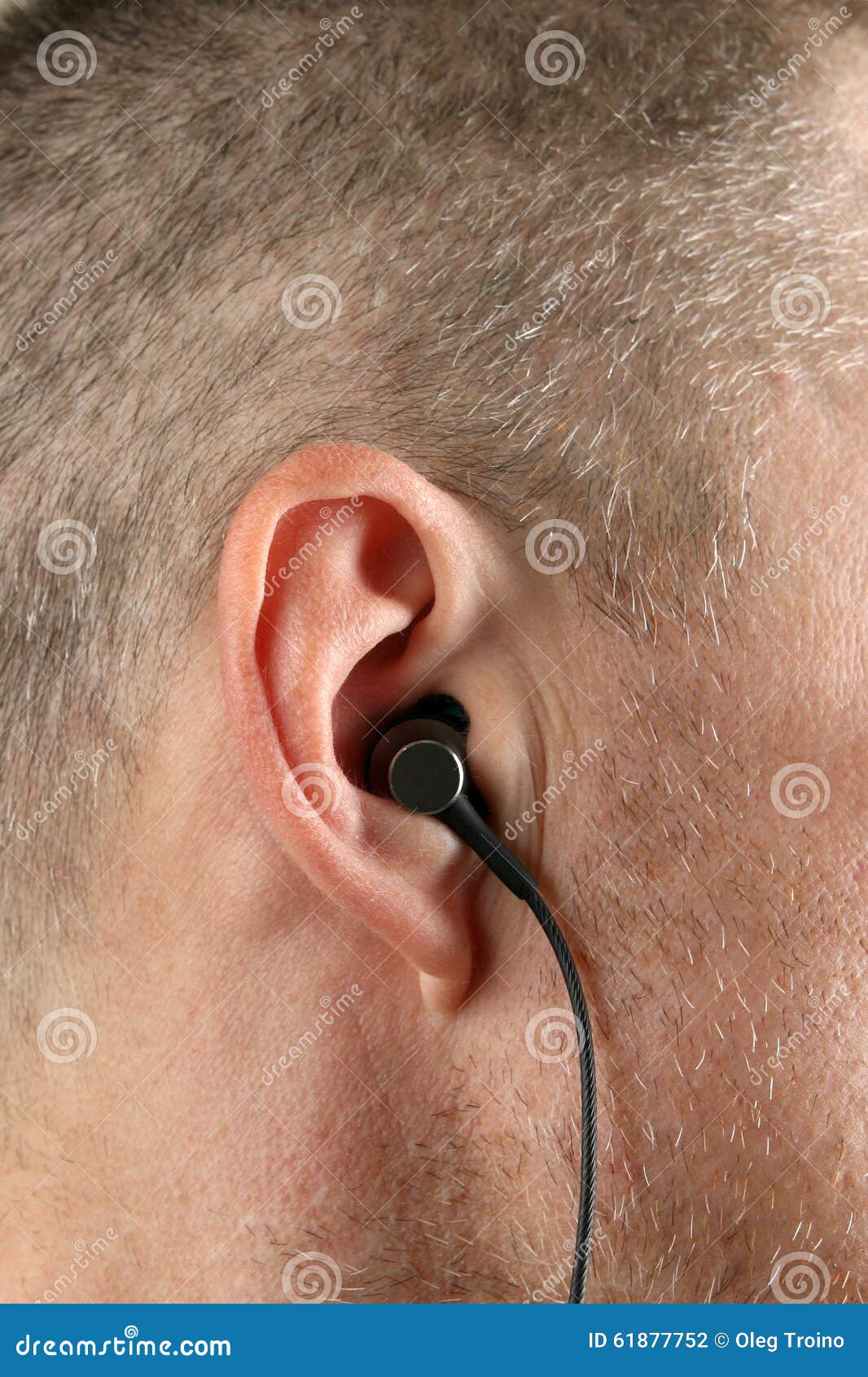 Small Earphones Inserted into the Ear of Men Close Up Stock Photo ...